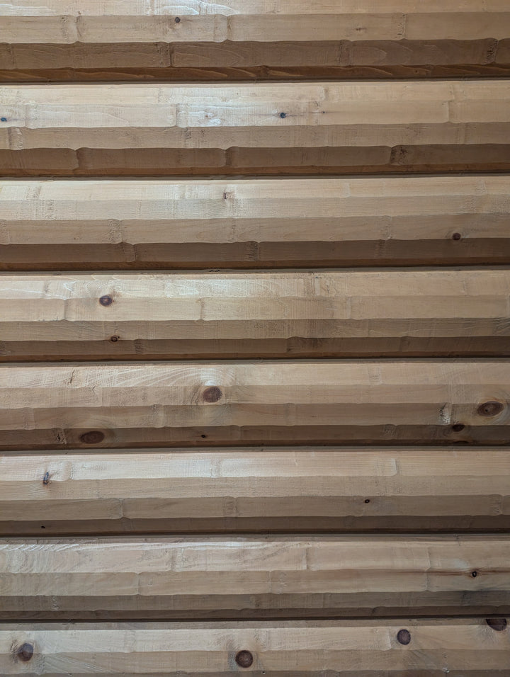 Cabin-Grade Half Log Siding – Log Home Mart